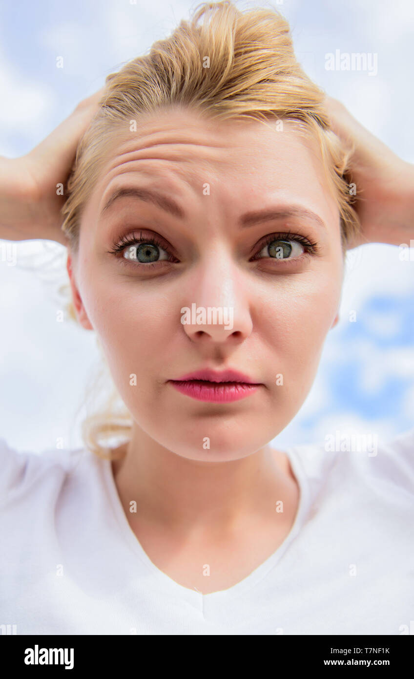 Crazy girl scream holding her head Stock Photo - Alamy