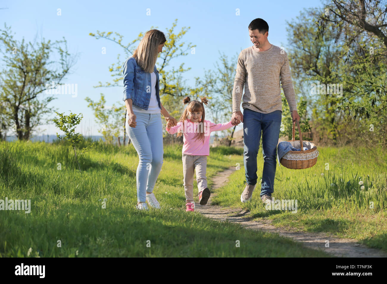 Happy family going on picnic in park Stock Photo - Alamy