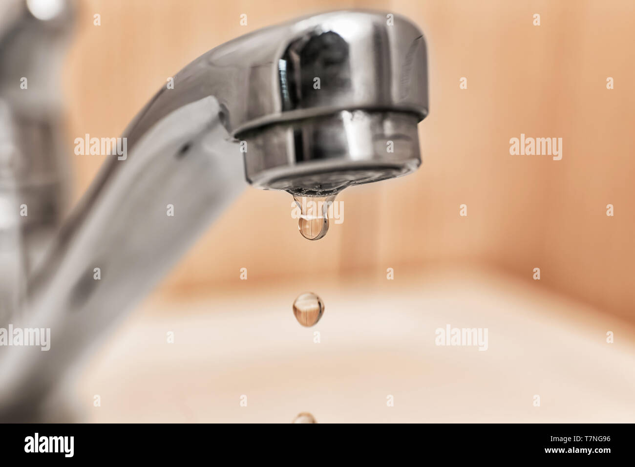Metal tap with dripping water, closeup. Water saving concept Stock ...