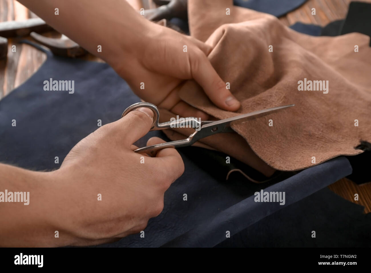 Cutting leather shoes hi-res stock photography and images - Alamy