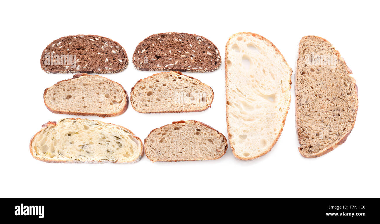 Different bread pieces on white background Stock Photo - Alamy
