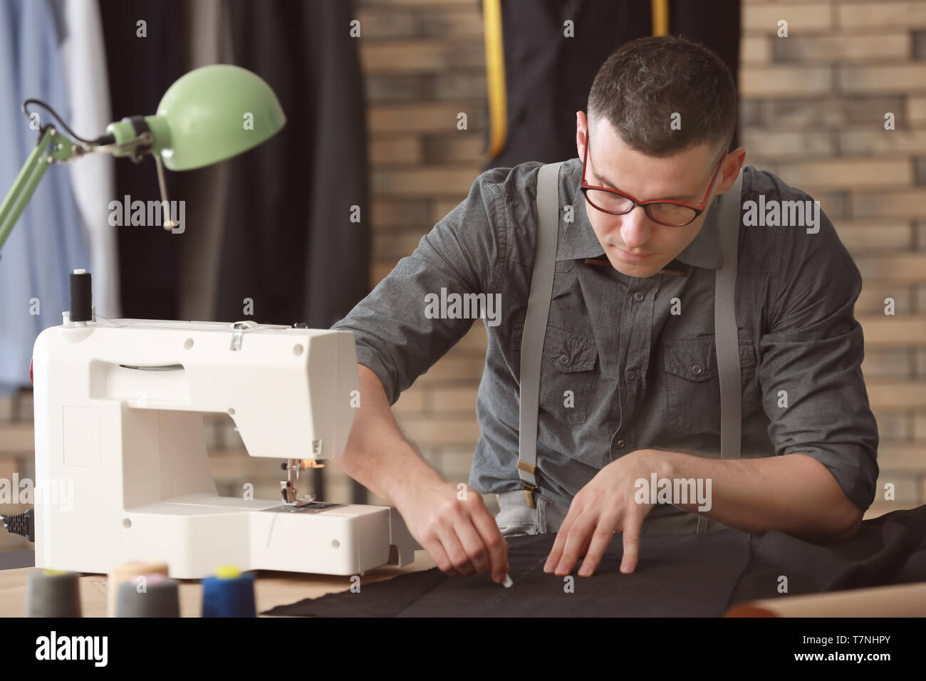 Tailor marking cloth hi-res stock photography and images - Alamy