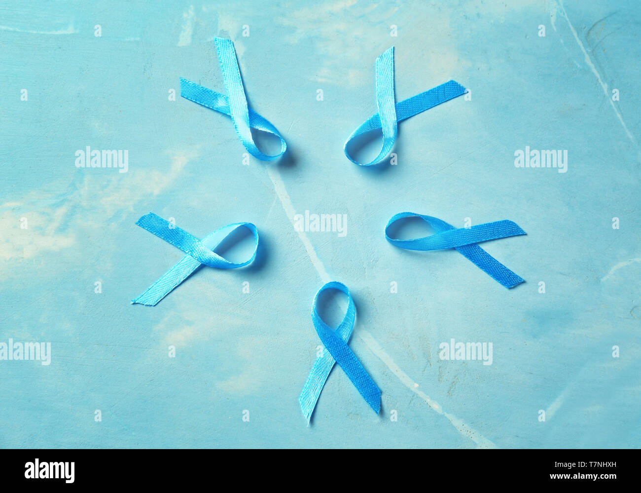 Blue ribbons on color background. Prostate cancer concept Stock Photo ...
