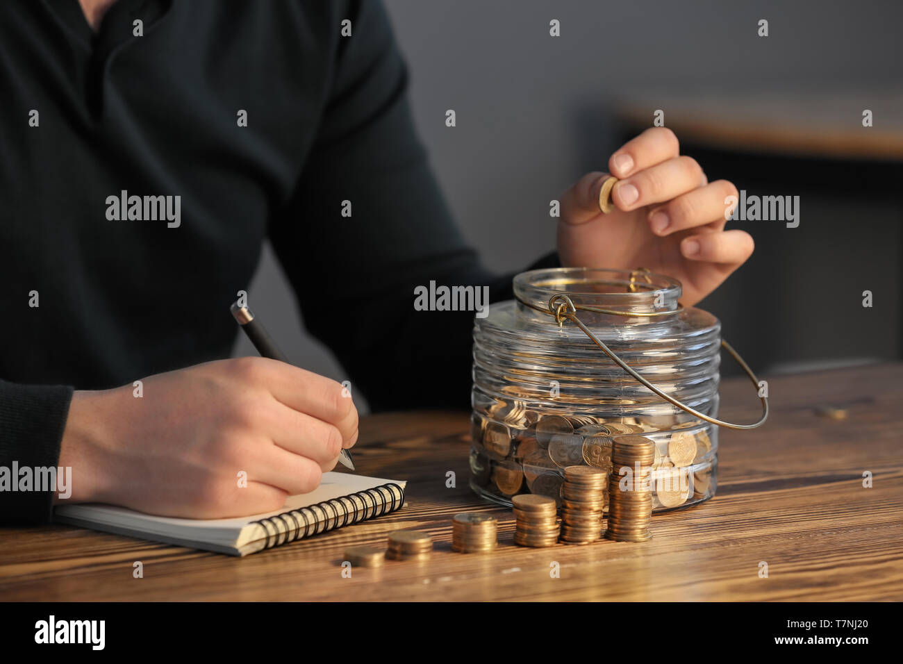 Man counting stacks of money hi-res stock photography and images - Alamy