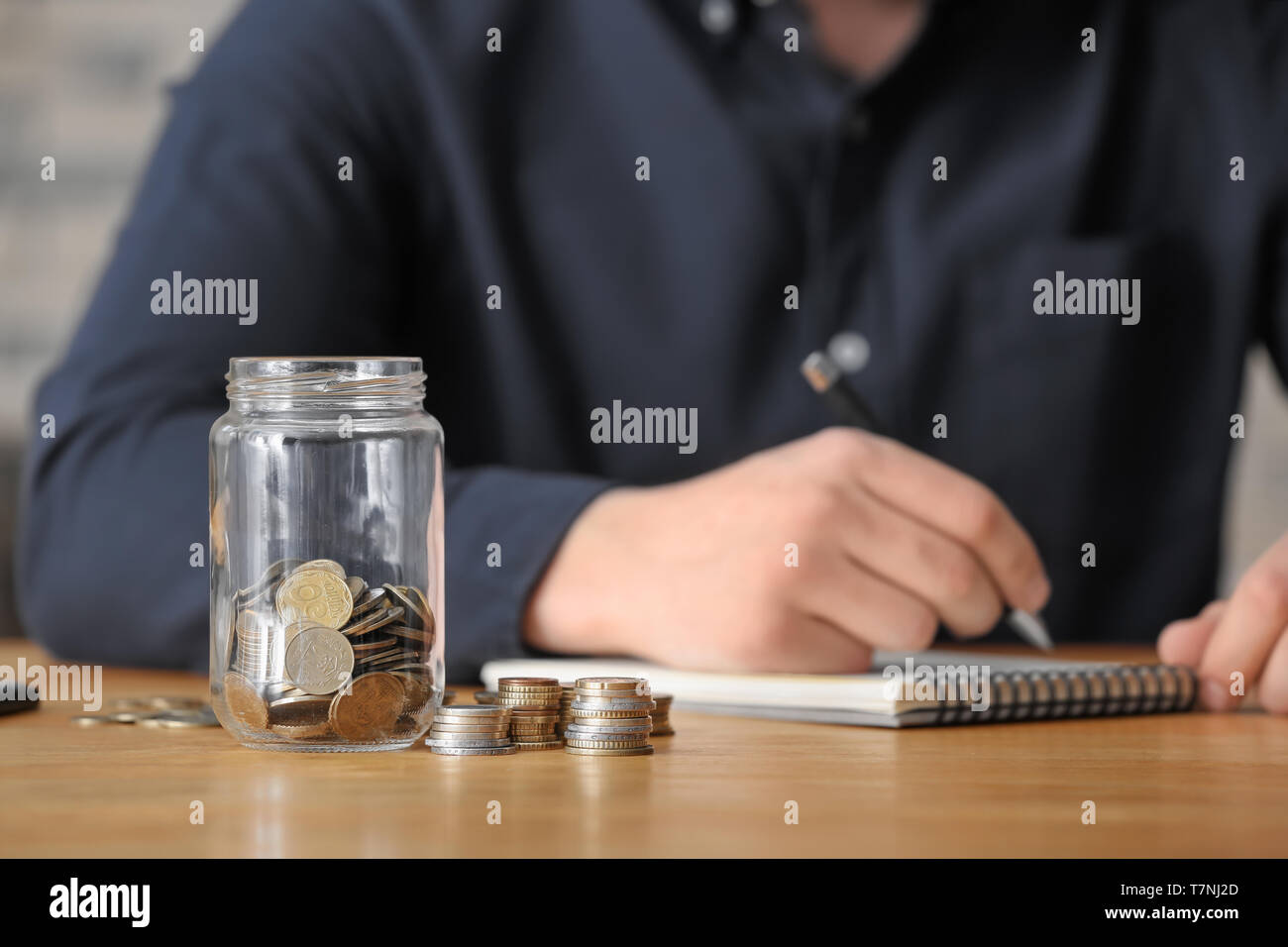 Man counting stacks of money hi-res stock photography and images - Alamy