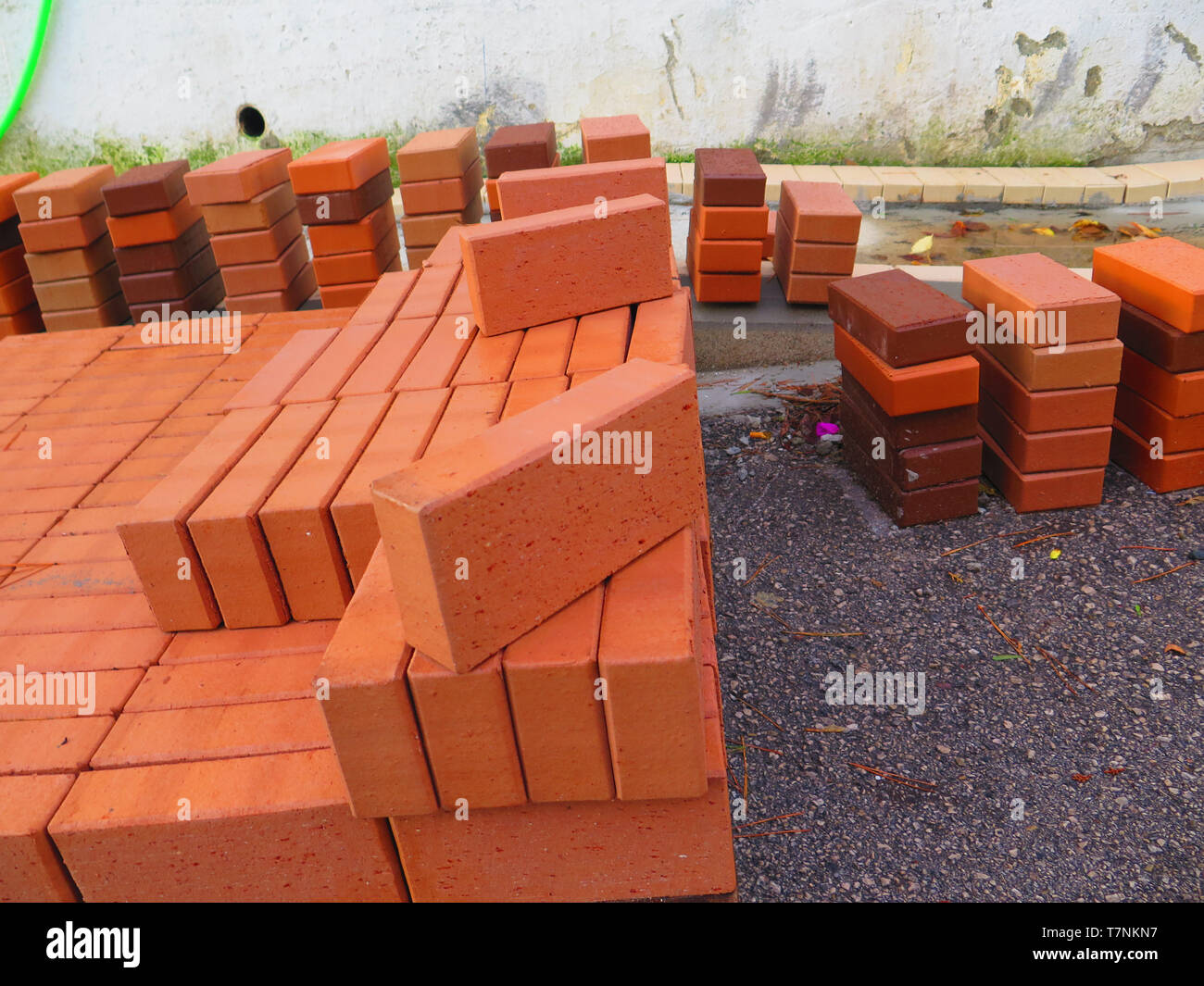 Pavement bricks stacked in street during road refurbishment in ...