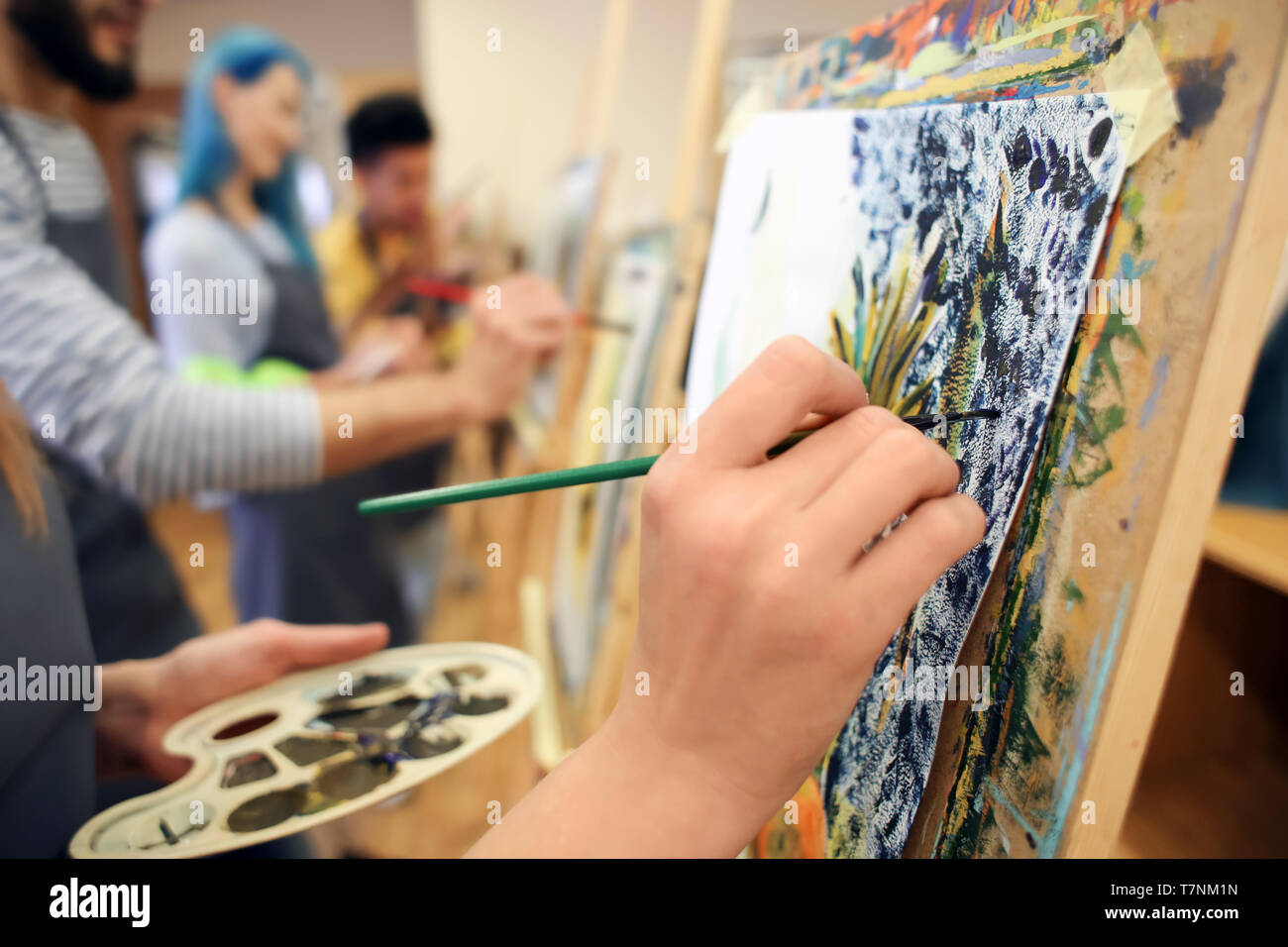 Female students painting still hi-res stock photography and images - Alamy