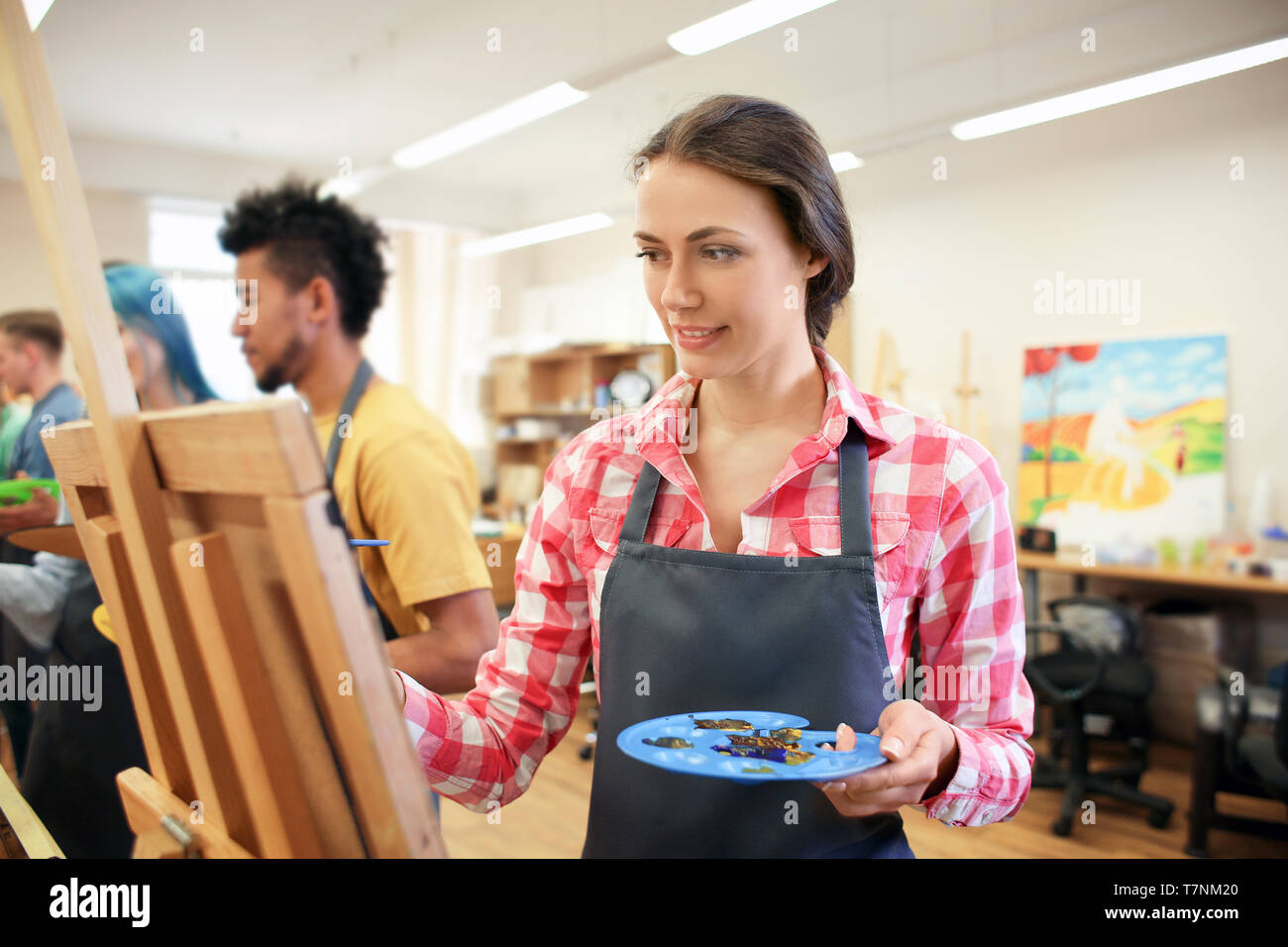 Art students painting in workshop Stock Photo - Alamy