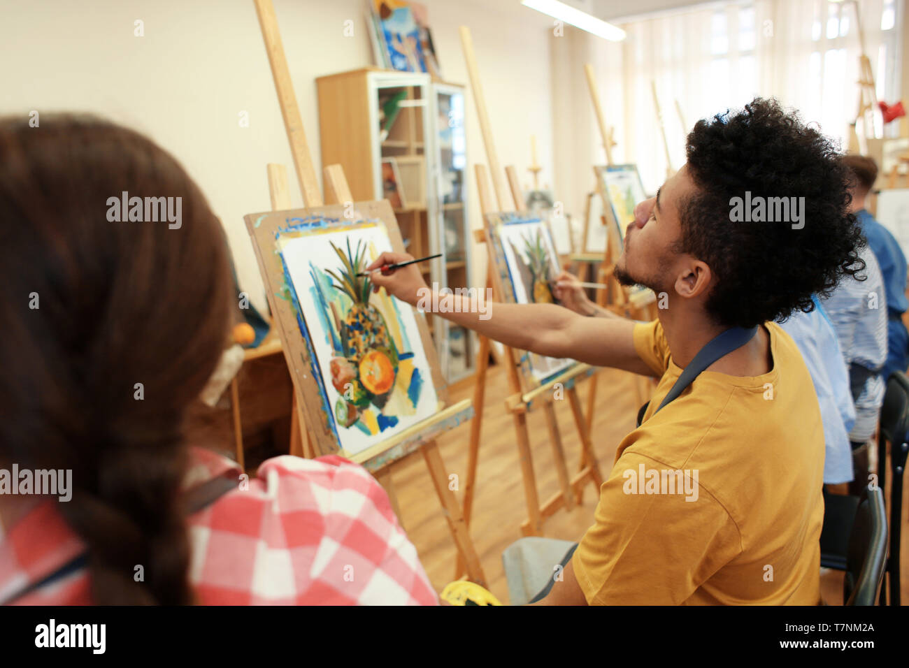 Art students painting in workshop Stock Photo - Alamy