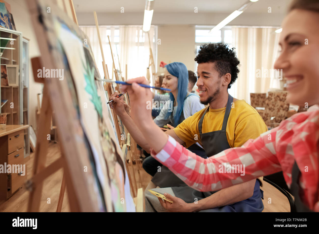 Female students painting still hi-res stock photography and images - Alamy