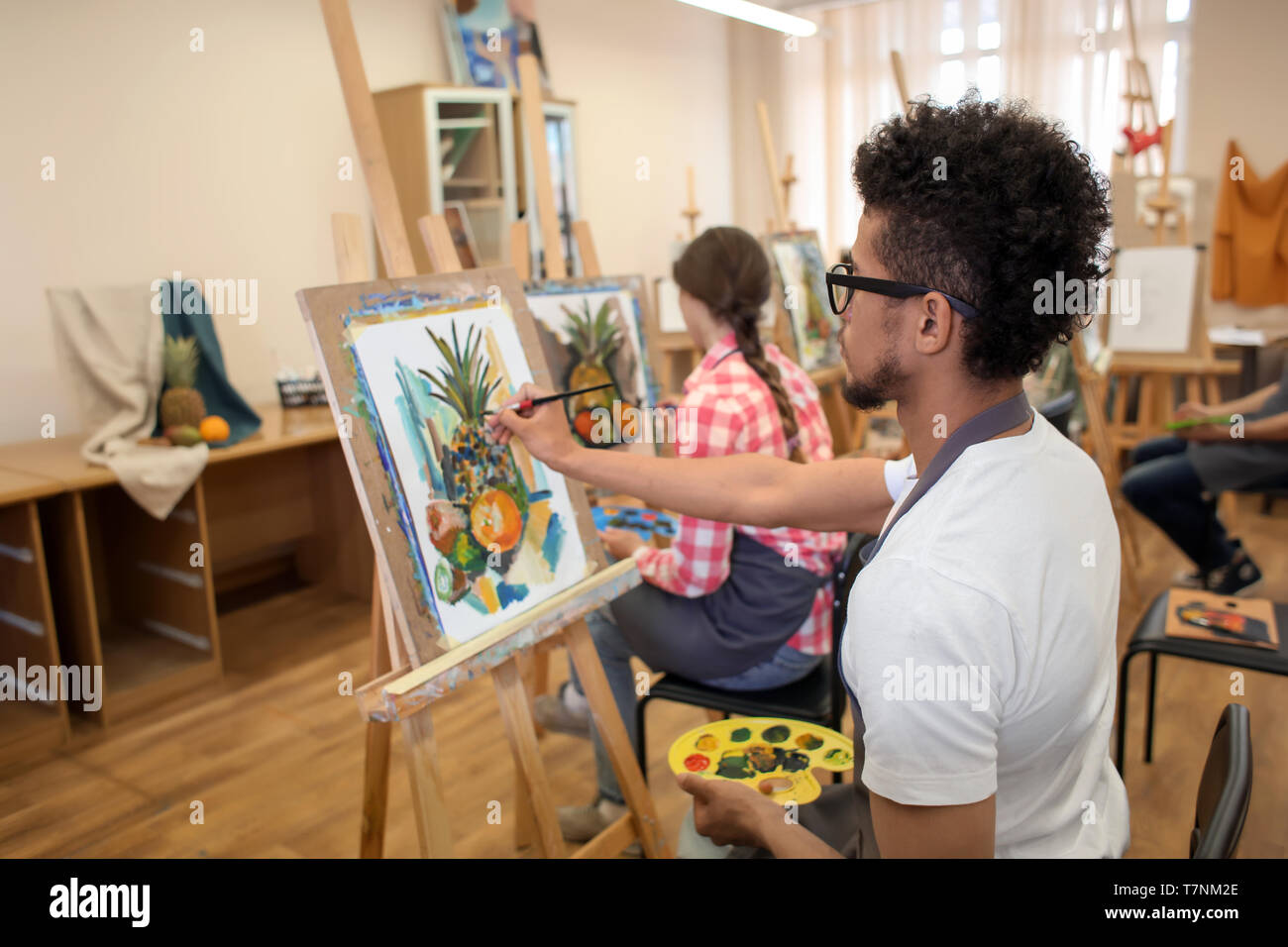 Female students painting still hi-res stock photography and images - Alamy