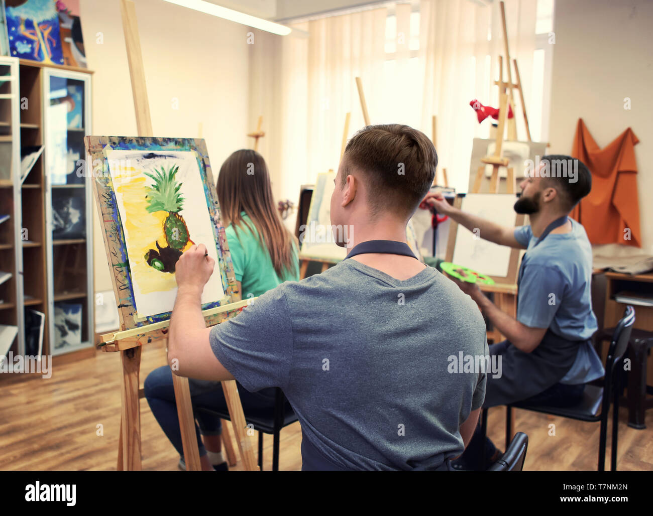 Female students painting still hi-res stock photography and images - Alamy