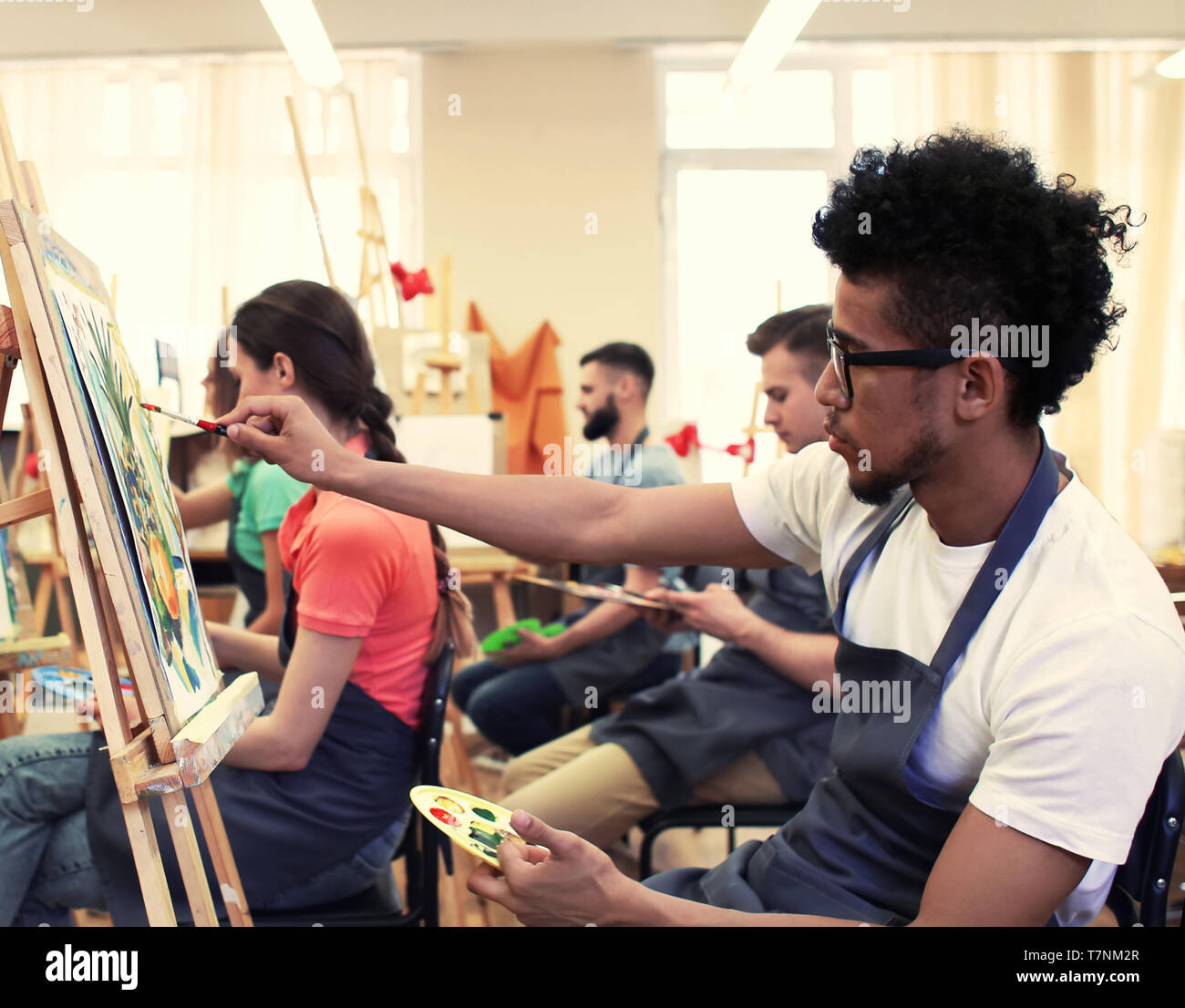 Female students painting still hi-res stock photography and images - Alamy