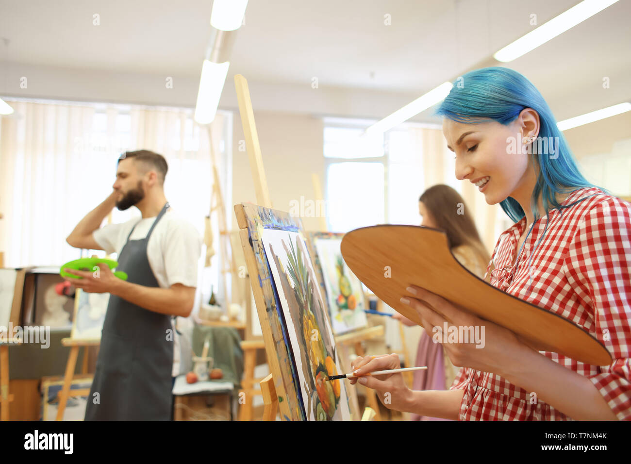 Female students painting still hi-res stock photography and images - Alamy