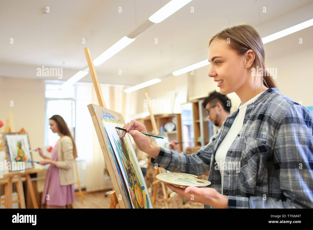 Female students painting still hi-res stock photography and images - Alamy