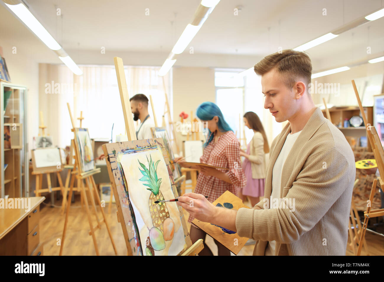 Female students painting still hi-res stock photography and images - Alamy