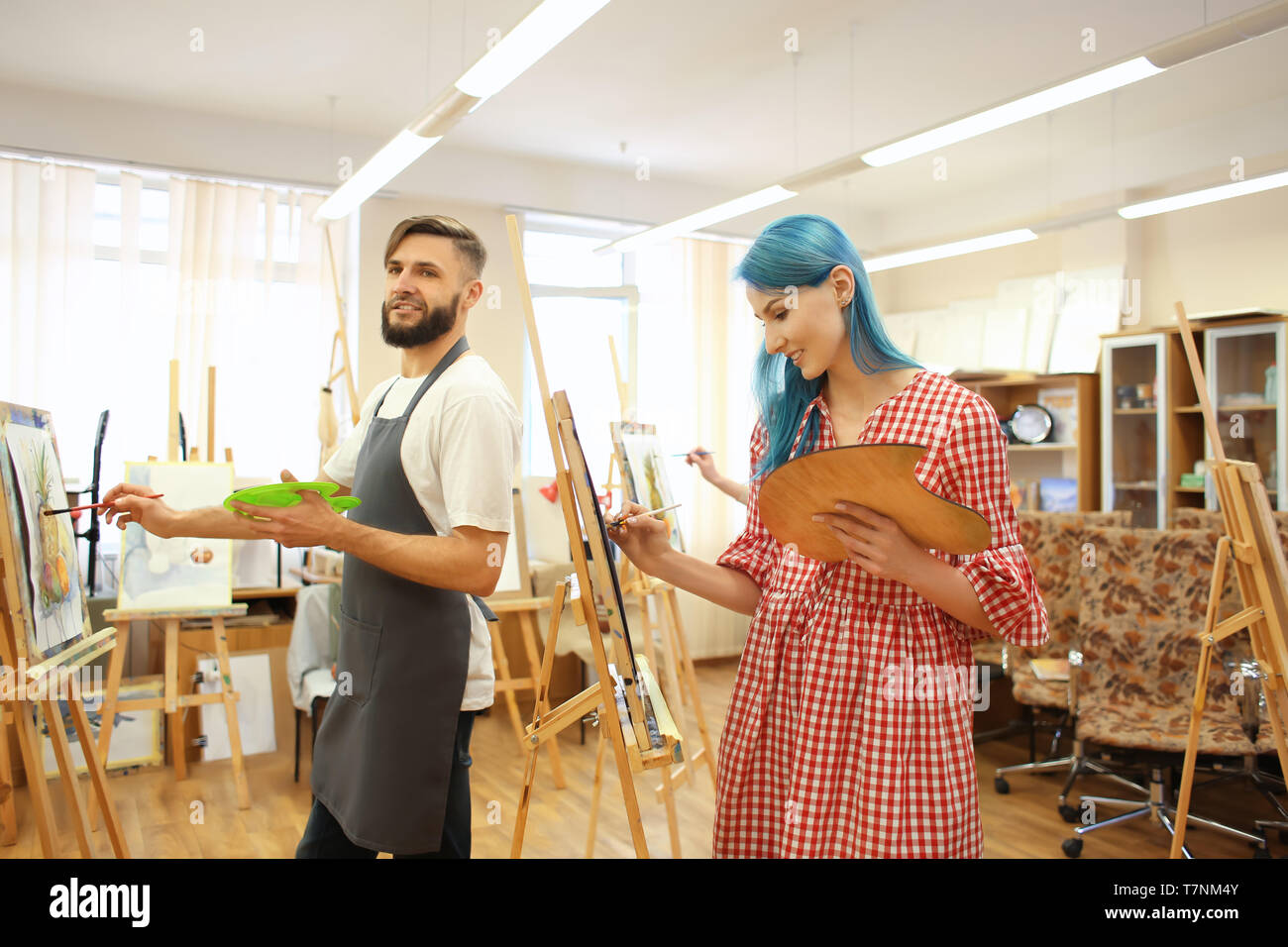 Female students painting still hi-res stock photography and images - Alamy