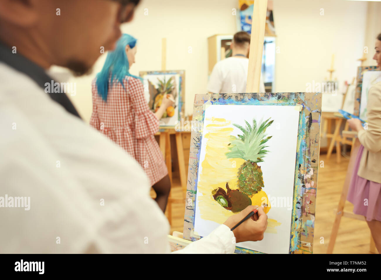 Art students painting in workshop Stock Photo - Alamy
