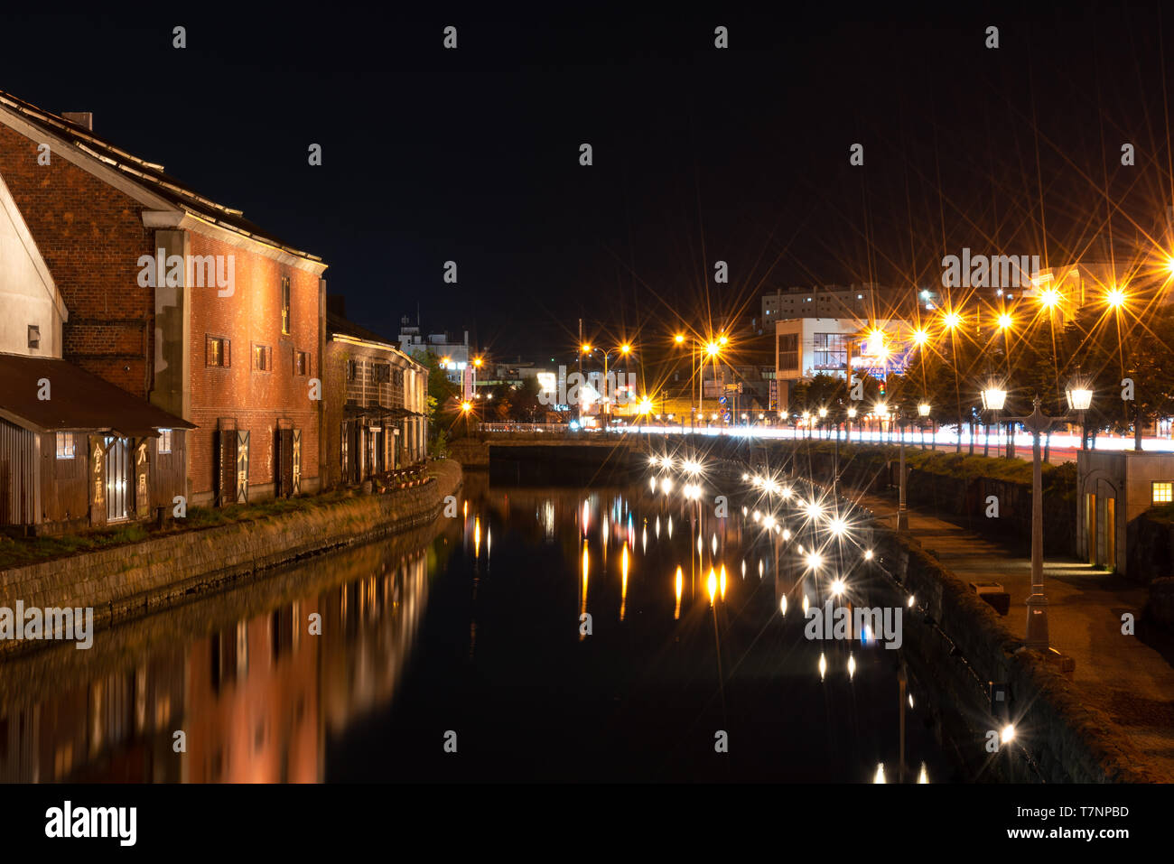 Landscape view of Otaru canals and warehouse at night in Hokkaido Japan ...