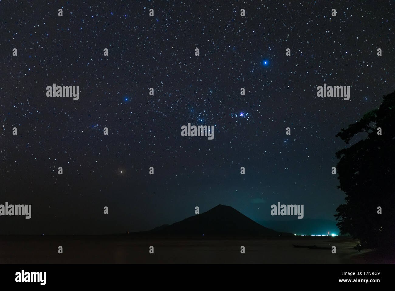 Orion constellation starry sky stars over Gunung Api volcanic island ...