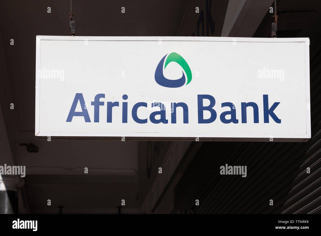 African Bank sign hanging down from a ceiling outside a building in the city centre of Cape Town ...