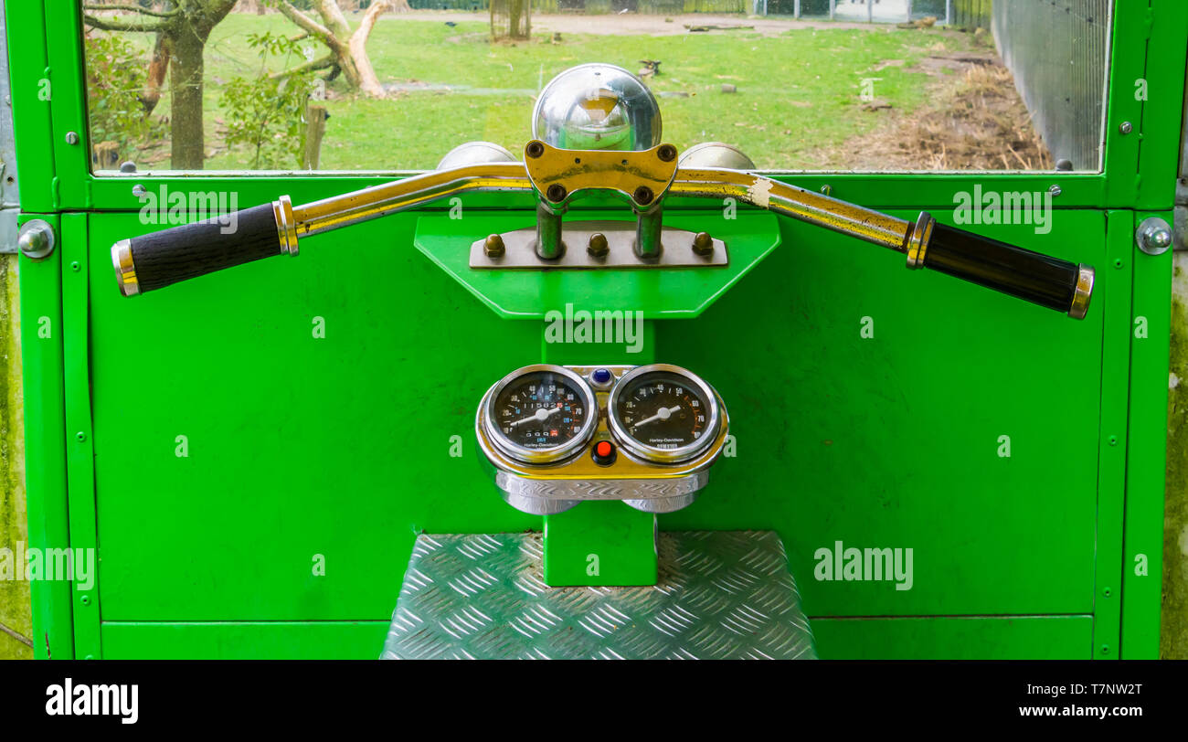 the cockpit of a rickshaw, children toys, steering wheel with ...