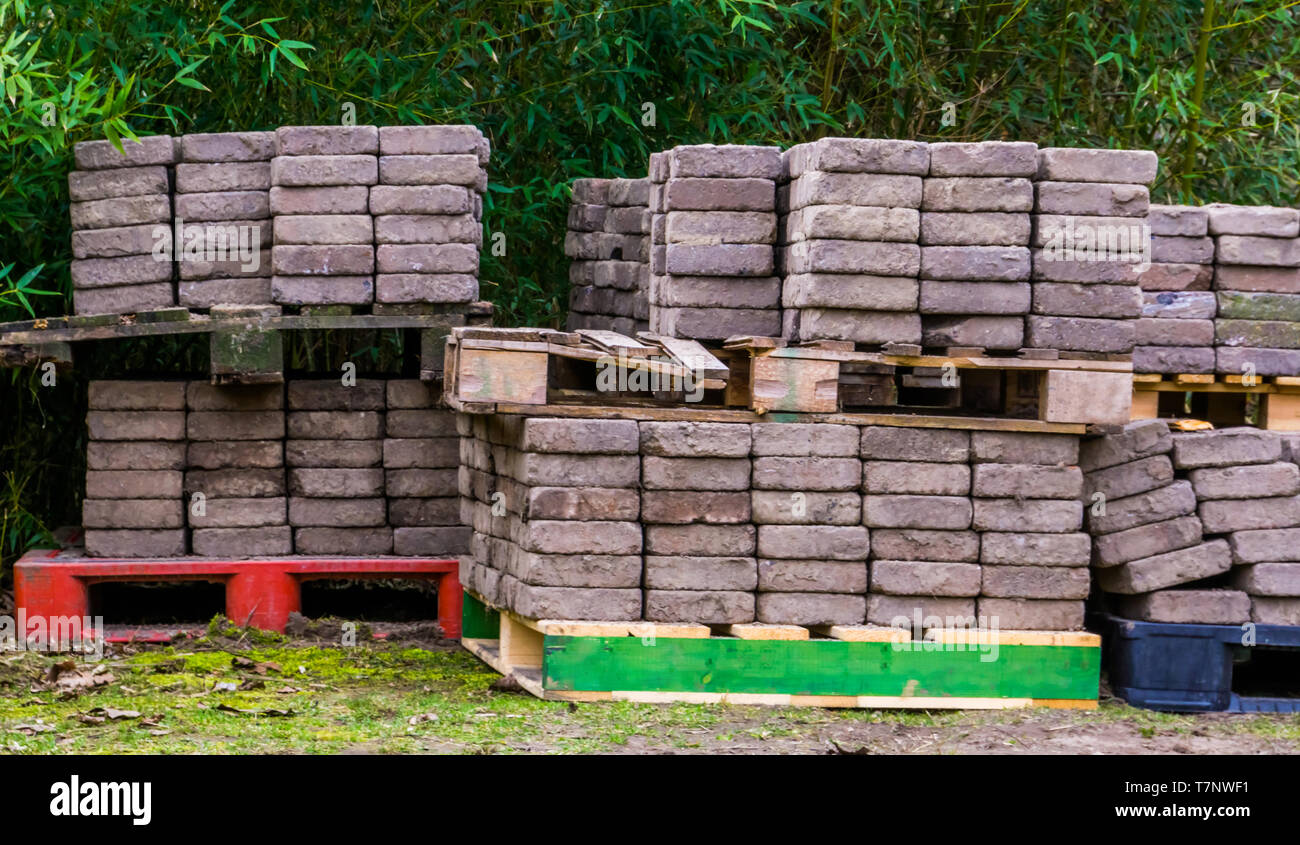 paving stones stacked on pallets, street construction materials ...