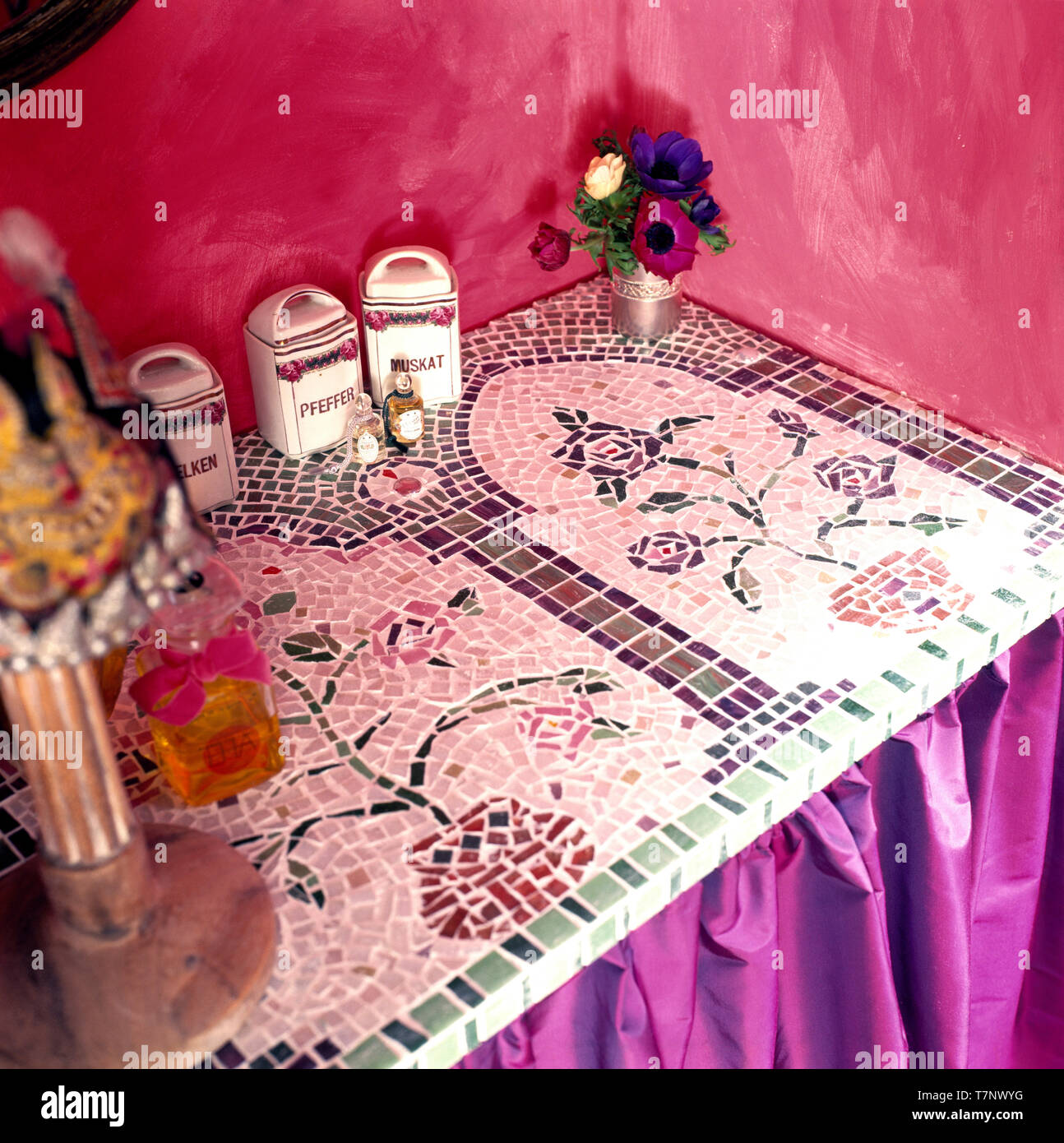 Close-up of a mosaic tiled vanity worktop in economy bedroom Stock ...