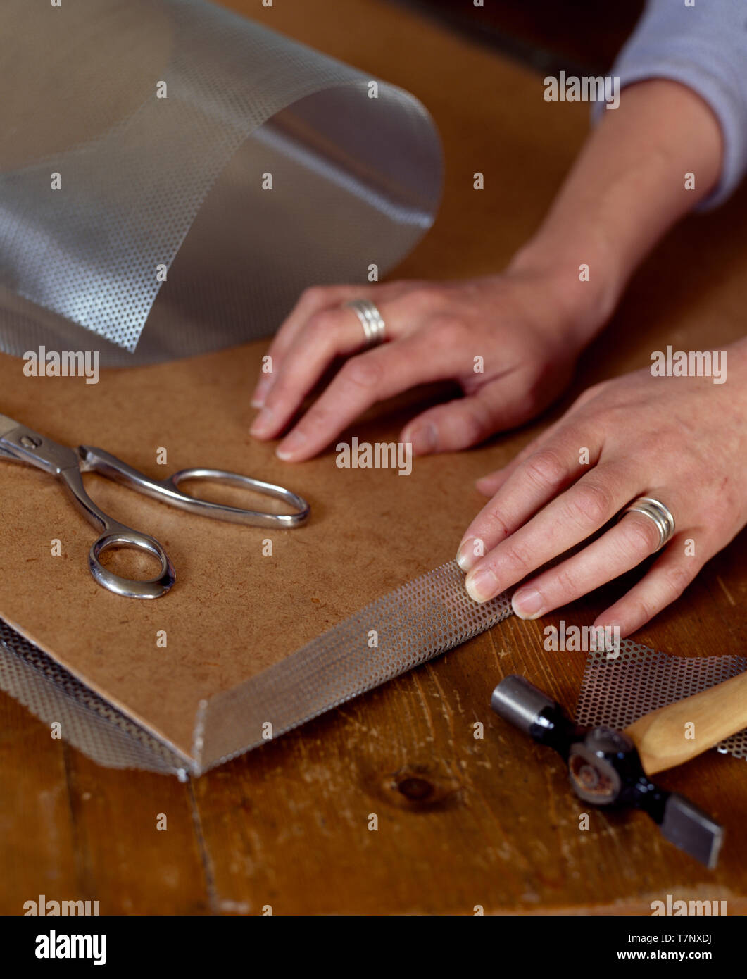 Hand pressing down hi-res stock photography and images - Alamy