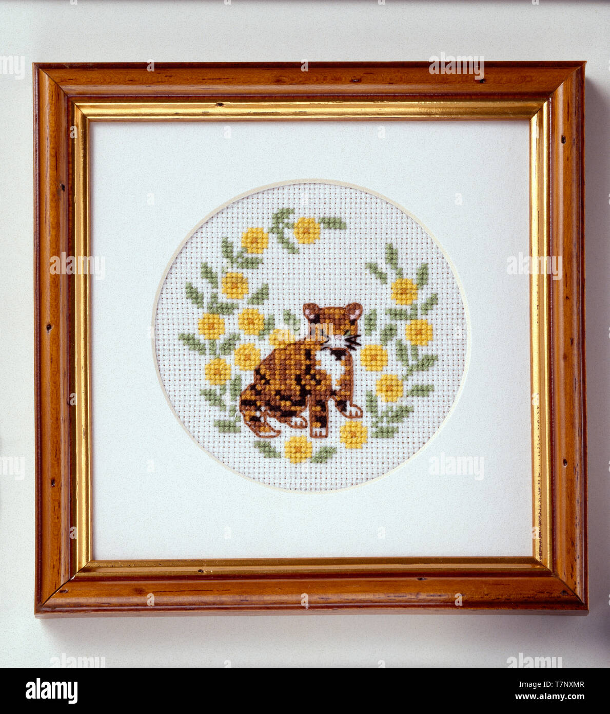Embroidered picture of a cat Stock Photo - Alamy