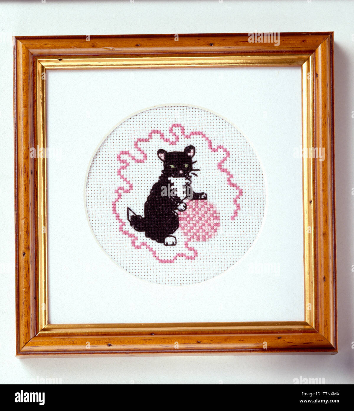 Embroidered picture of a cat Stock Photo - Alamy