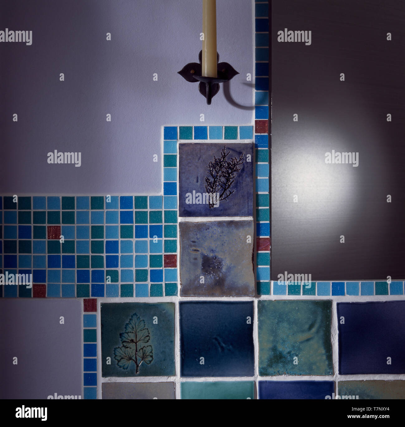 Close-up of blue tiled and mosaic tiled splash-back Stock Photo - Alamy
