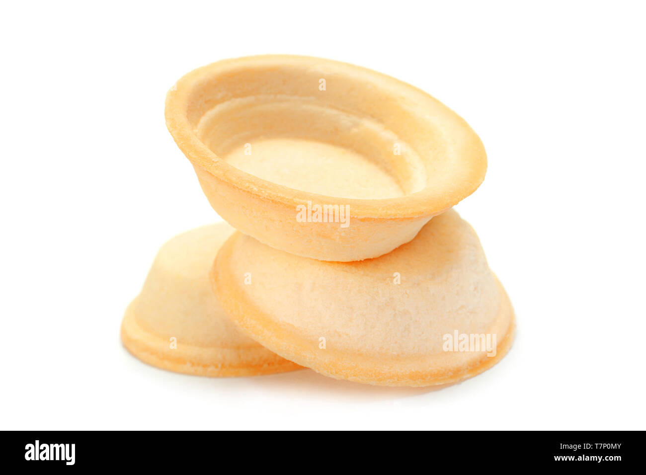 Empty baked tartlet closeup isolated on white background Stock Photo ...