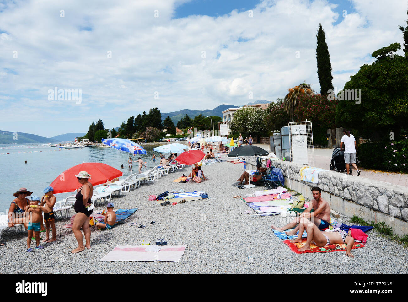 Montenegrin families enjoying the local beach around Plaža Ponta in ...