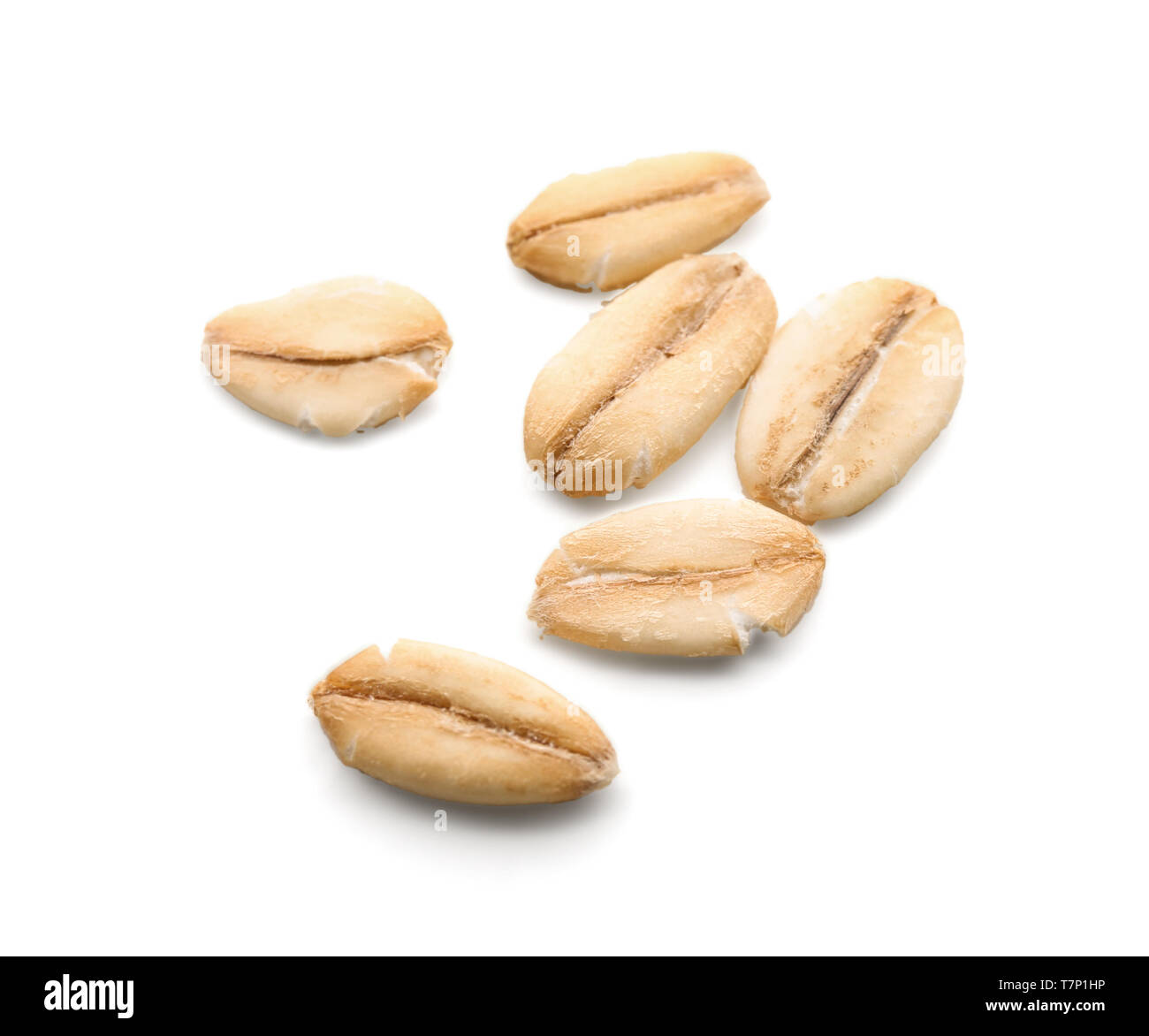 Raw oatmeal on white background Stock Photo - Alamy
