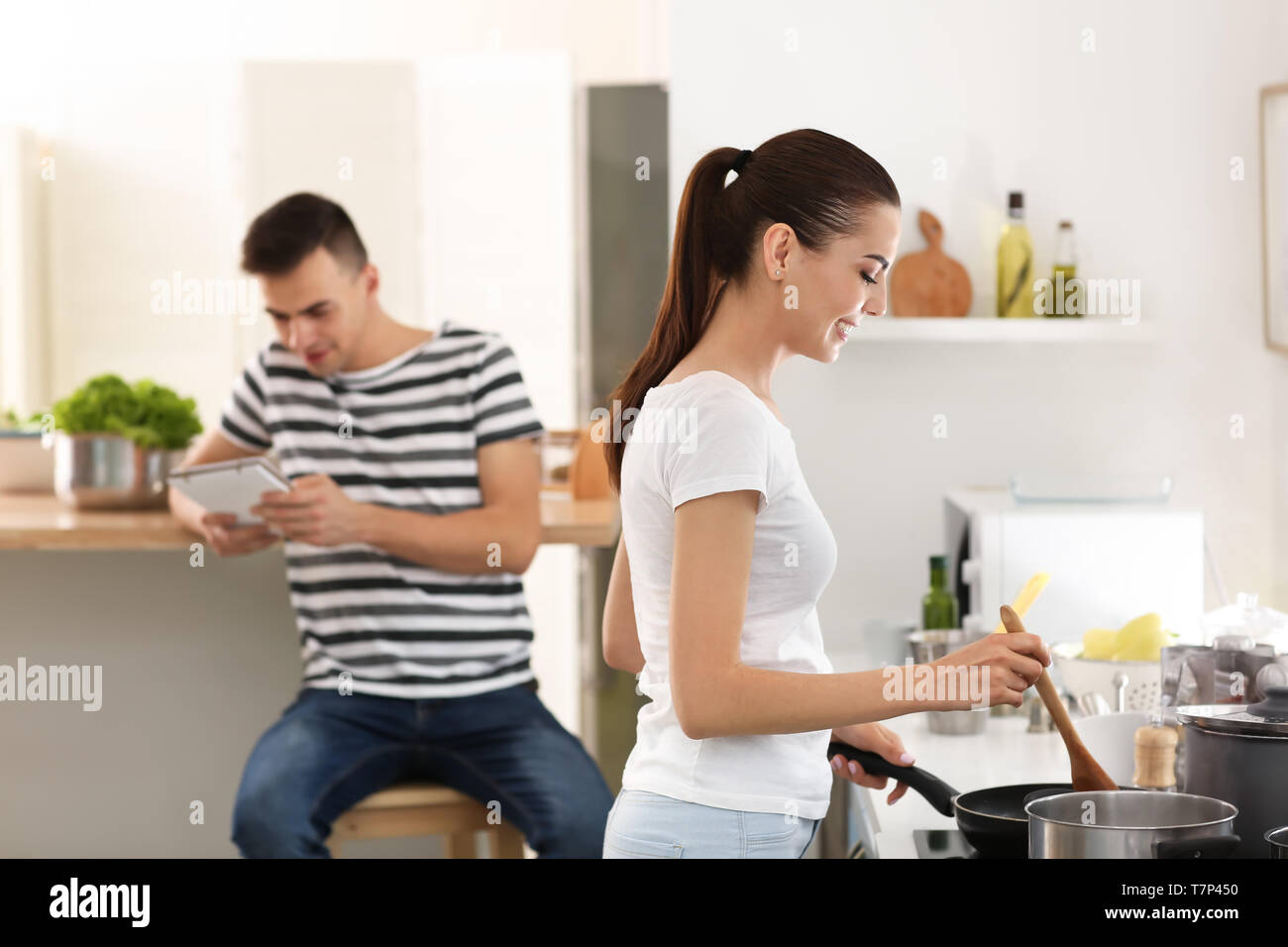 Reading recipe book hi-res stock photography and images - Alamy