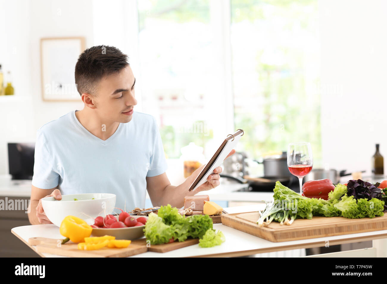 Reading recipe book hi-res stock photography and images - Alamy