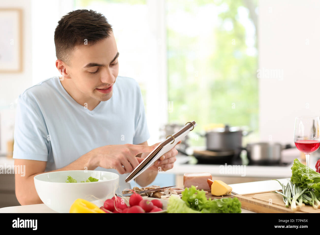 Reading recipe book hi-res stock photography and images - Alamy