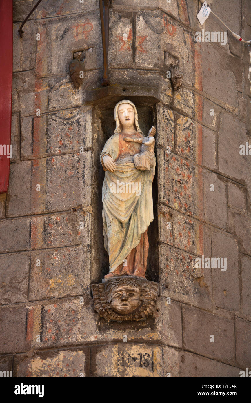 Religious stone carved statue of the Virgin Mary, medieval city of ...