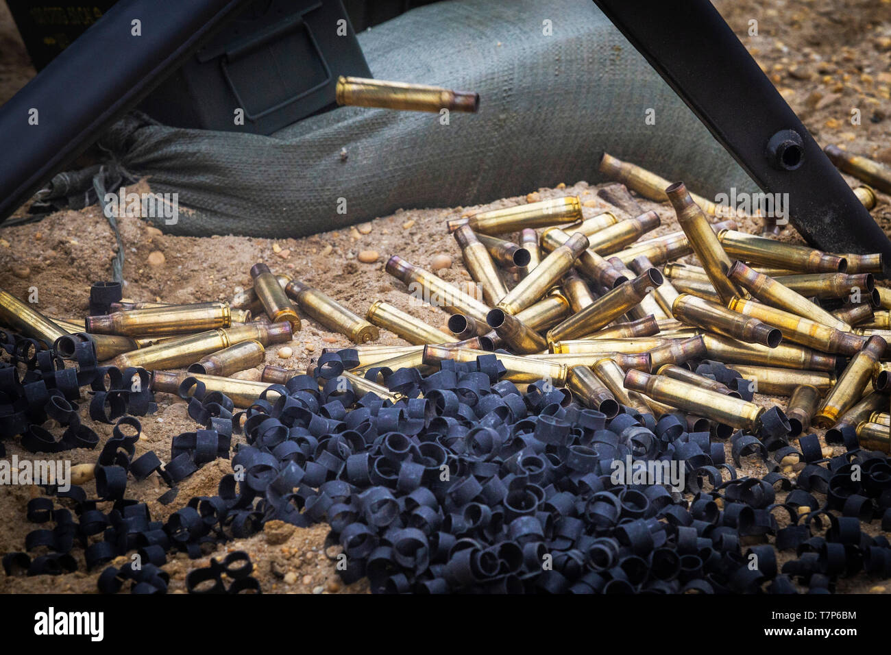 A M2 .50 caliber machine gun shell casing is ejected during the 50th ...