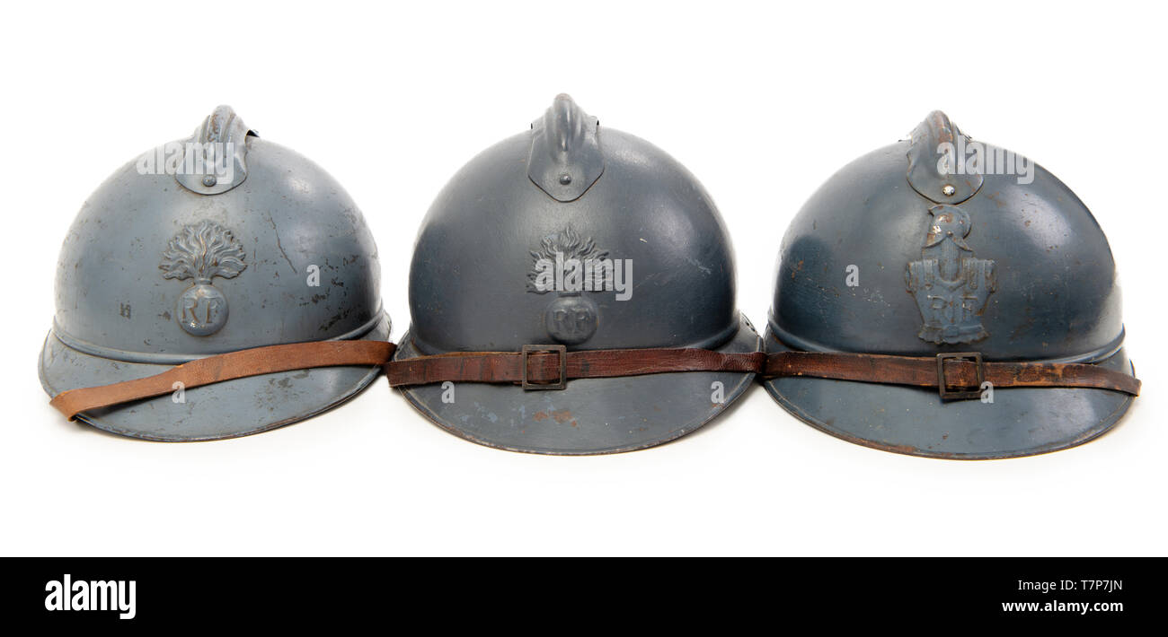 three french military helmets of the First World War on the white ...