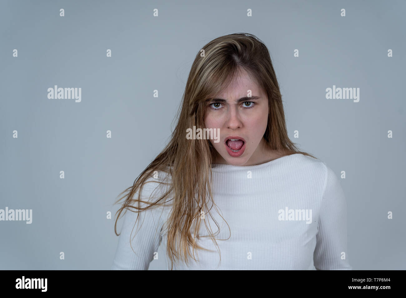 Annoyed irritated young teenager girl looking angry and mad. Feeling ...