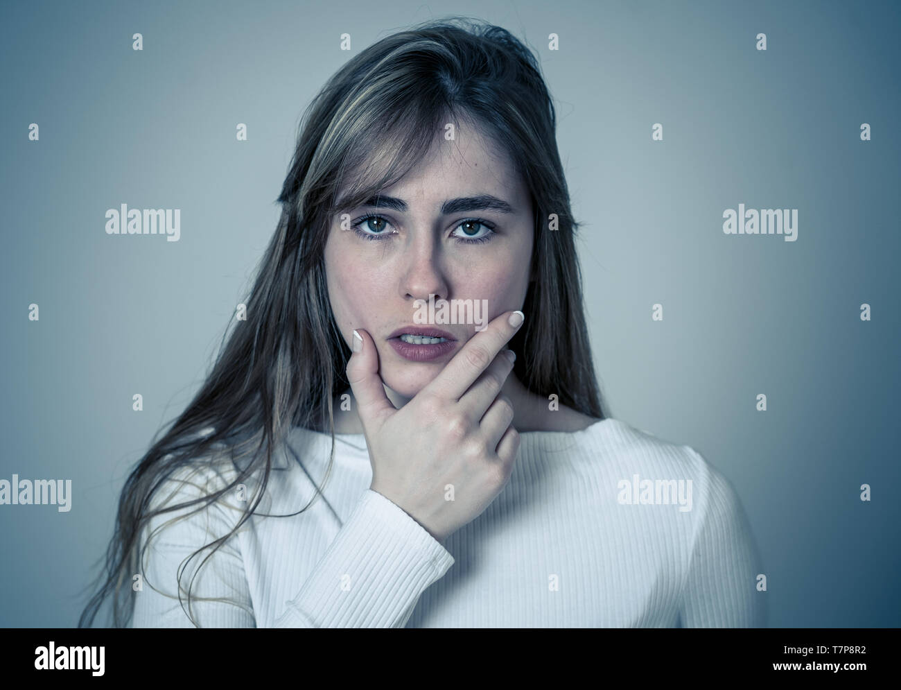 Portrait of young sad teenager girl feeling lonely and distressed ...