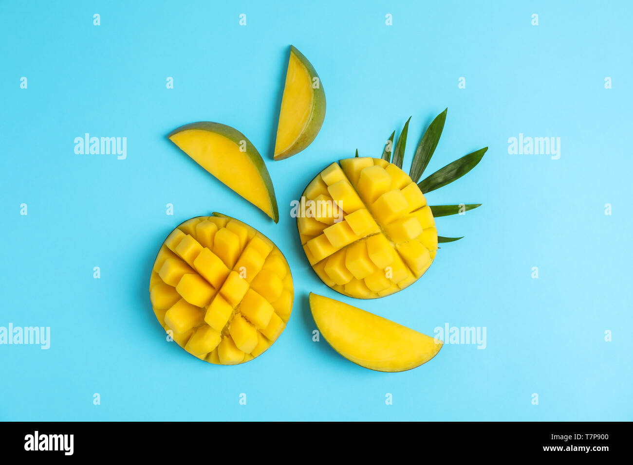 Flat lay composition with ripe mangoes on color background Stock Photo ...