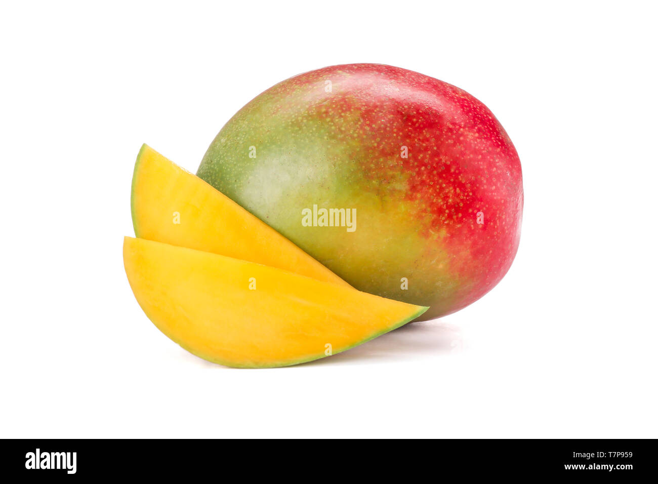 Mango with two pieces isolated on white background Stock Photo - Alamy