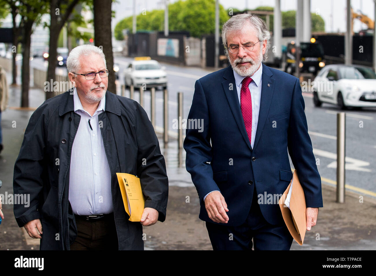 Former Sinn Fein President Gerry Adams (right) with Richard McAuley ...