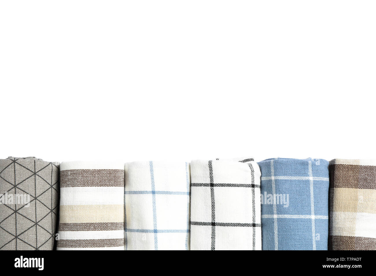 Rolled up fabric napkins isolated on white background Stock Photo - Alamy