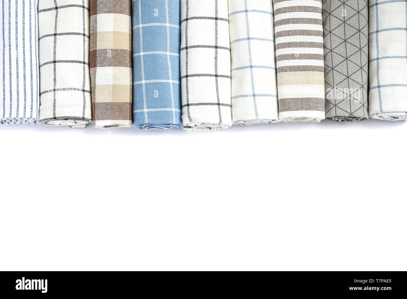 Rolled up fabric napkins isolated on white background Stock Photo - Alamy