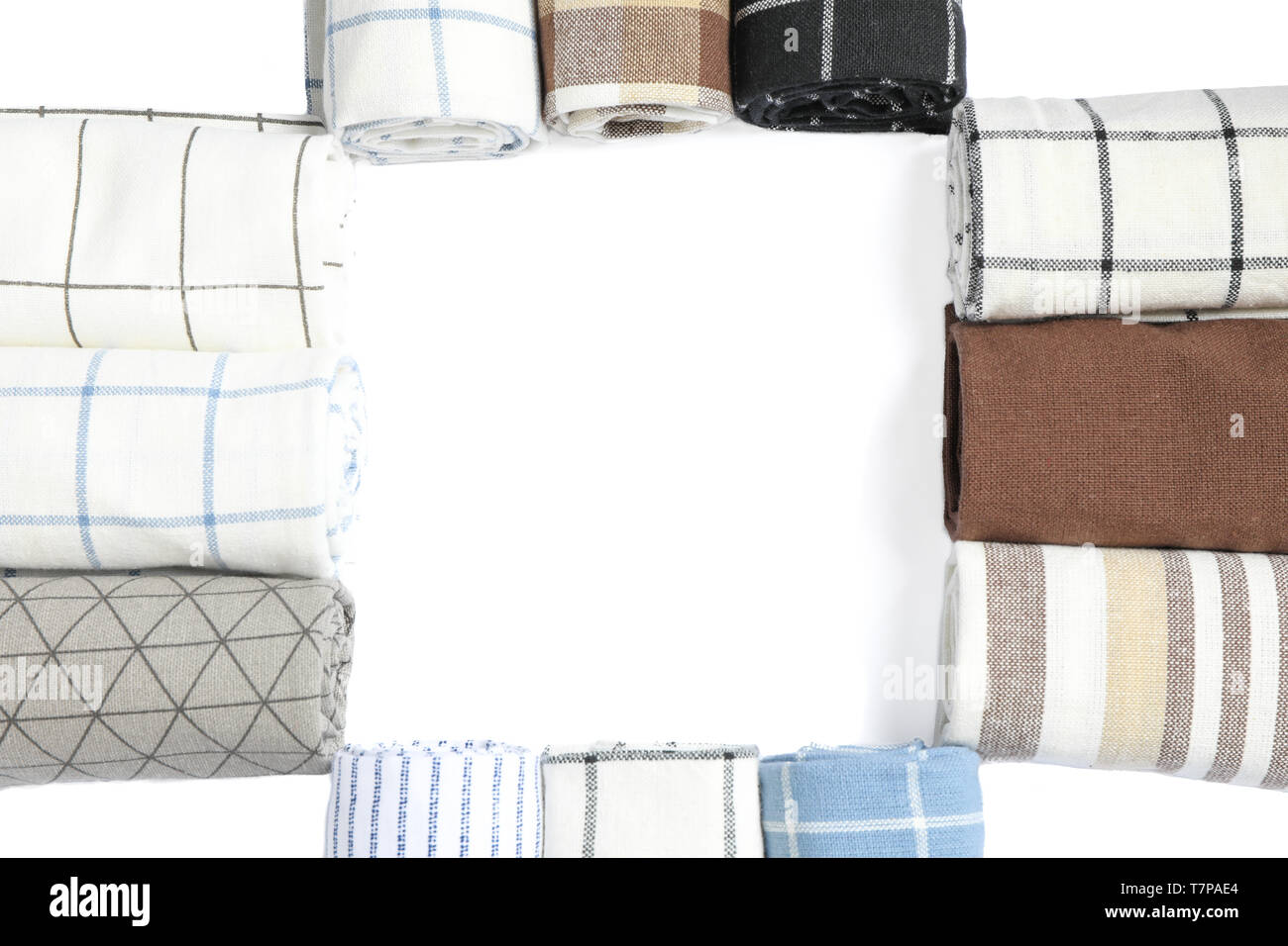 Rolled up fabric napkins isolated on white background Stock Photo - Alamy