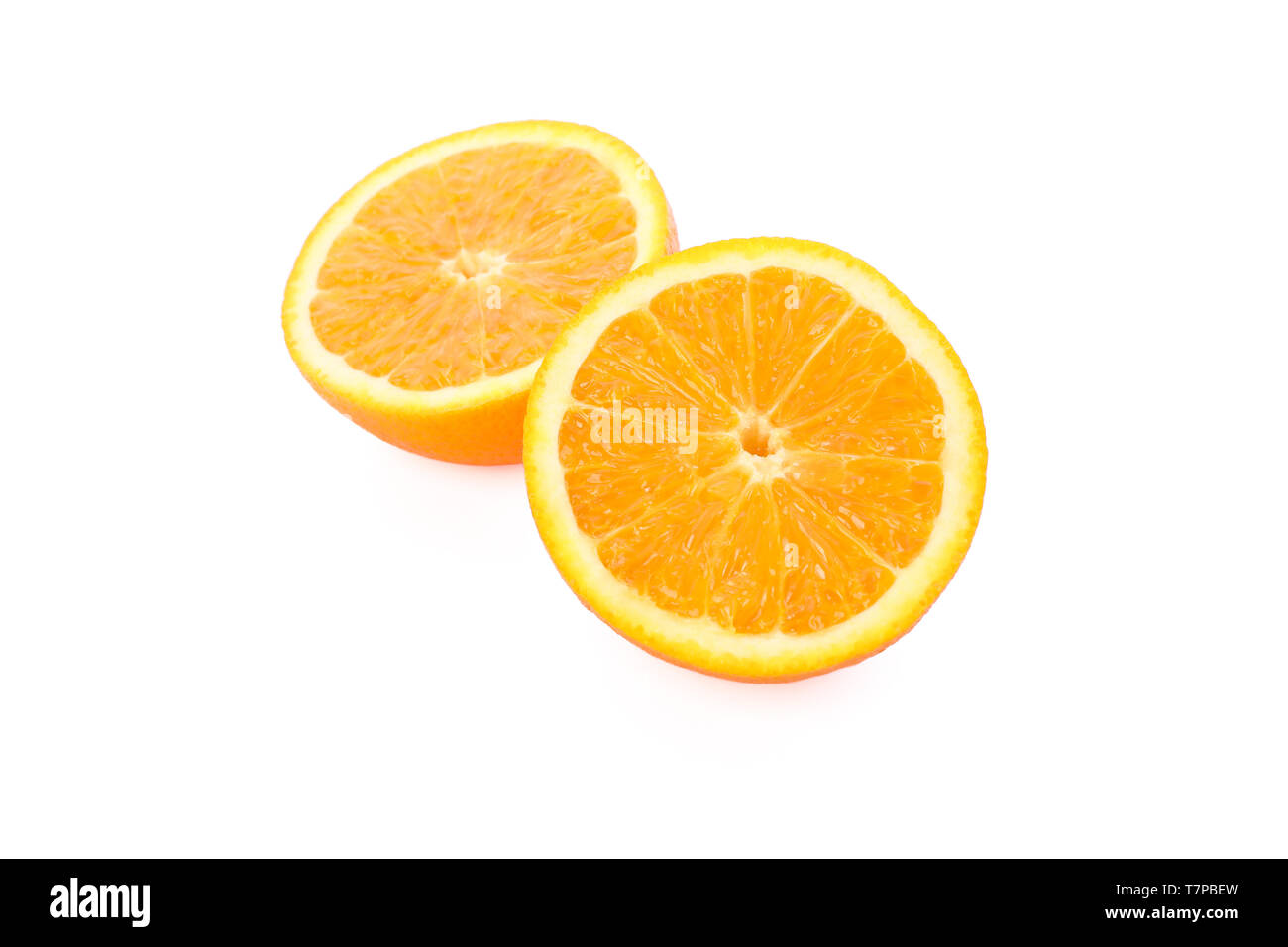 Orange halves isolated on white background. Citrus food Stock Photo - Alamy